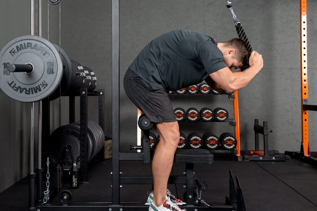 Standing Pulldown 9 Standing Exercises You Can Do At Work Or While