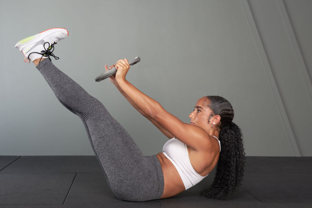 11 Weight Plate Exercises For A Solid Core | Mirafit